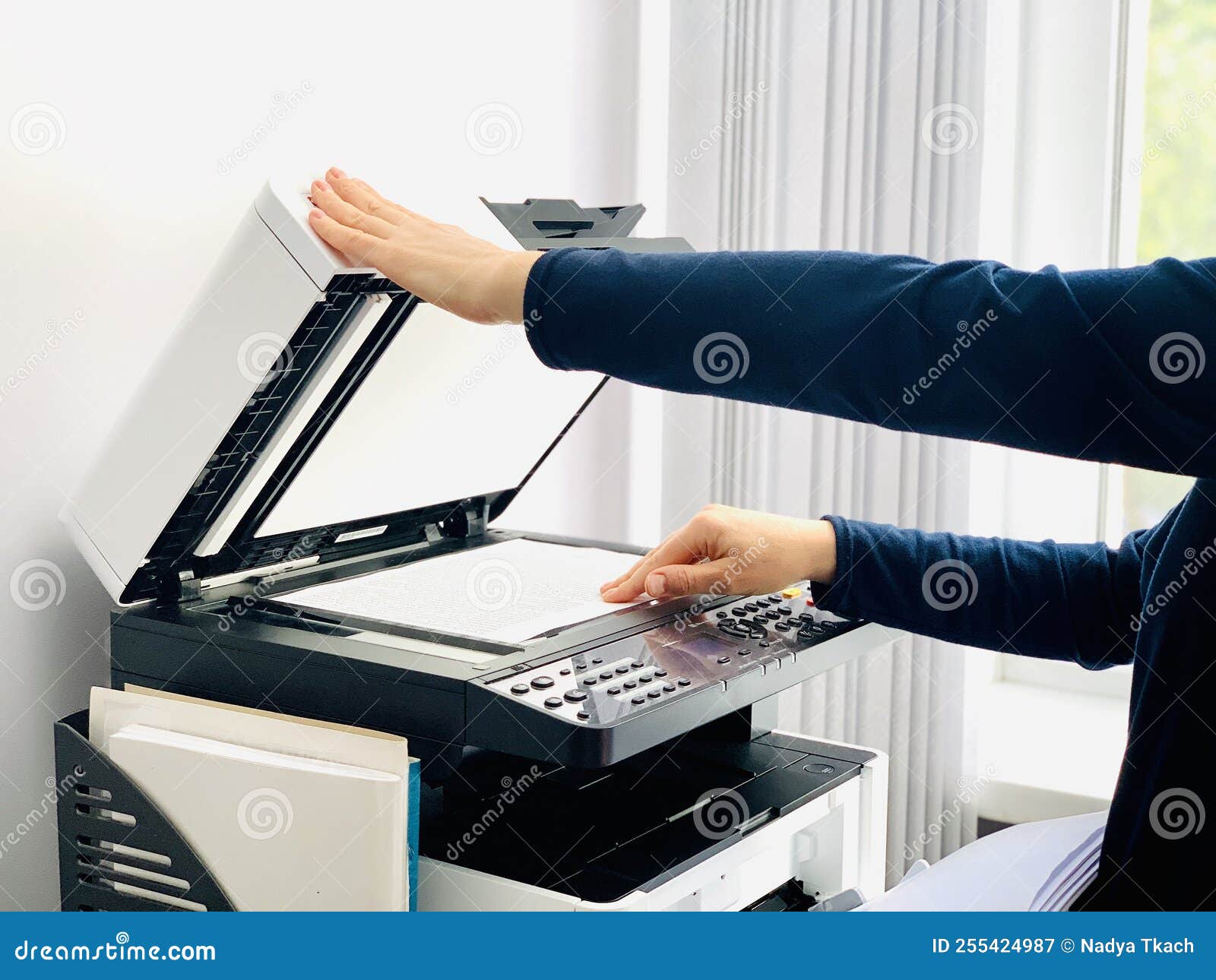 Office Worker Makes a Copy of Documents. Stock Image - Image of ...