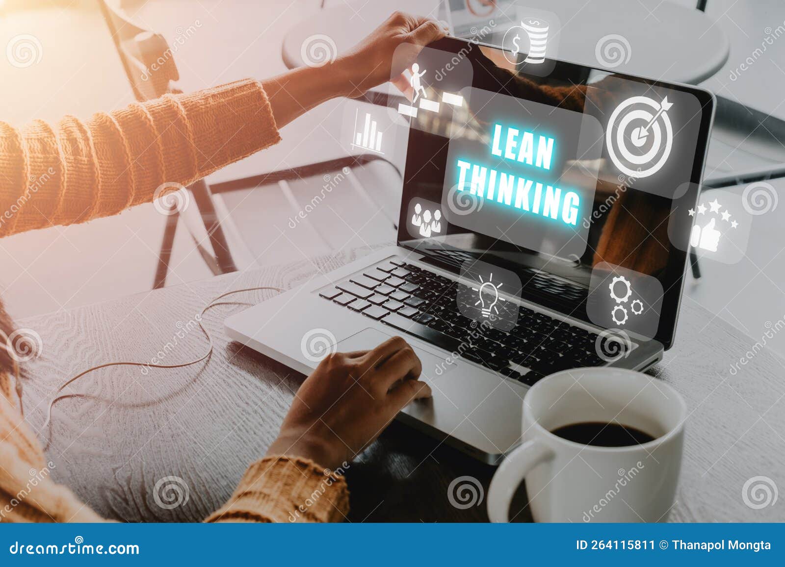 Person Using Computer in Cafe with Lean Thinking Icon on Virtual Screen ...