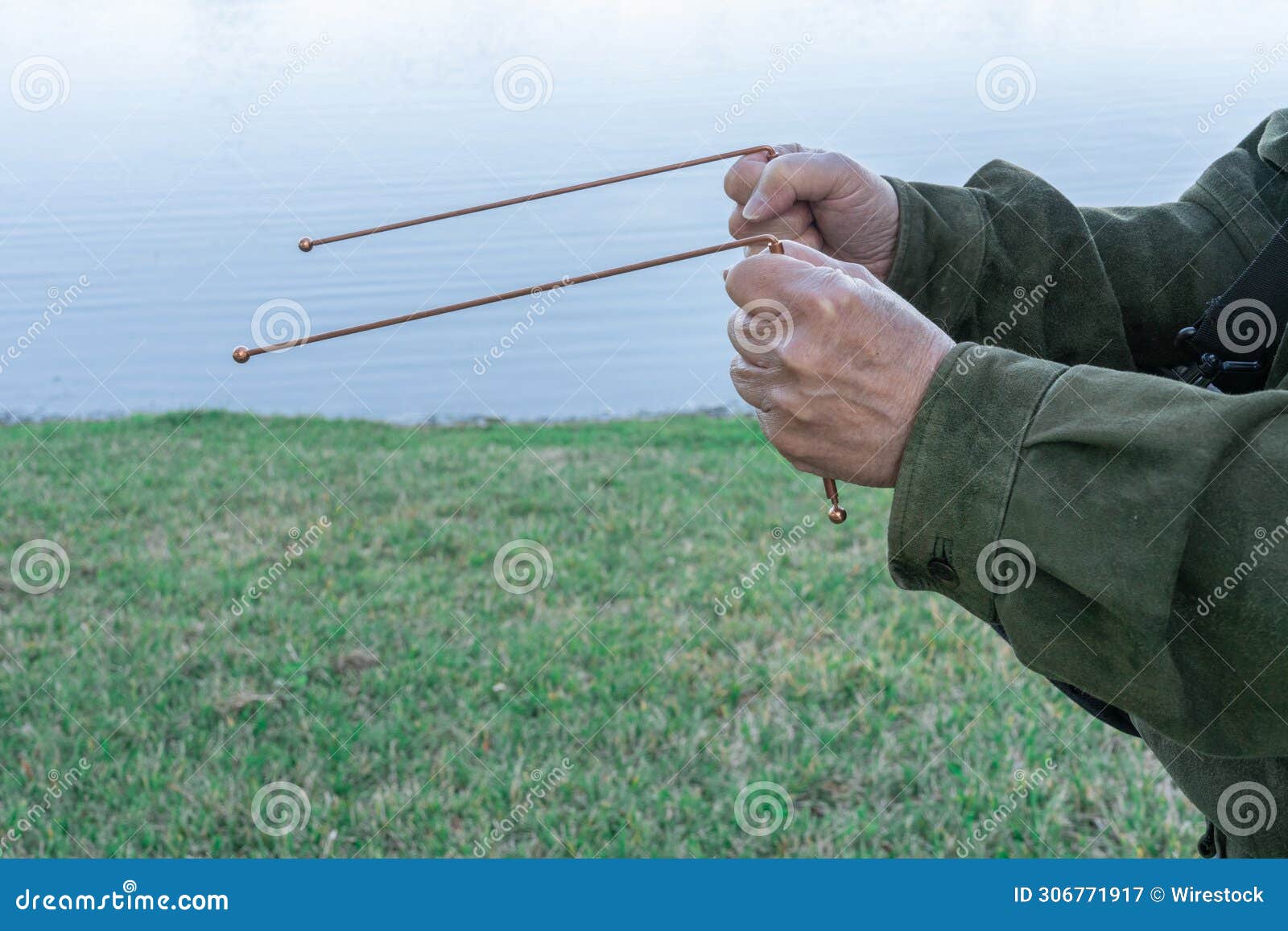 Person Using Dowsing Rods To Discover the Source of Water Stock Image ...