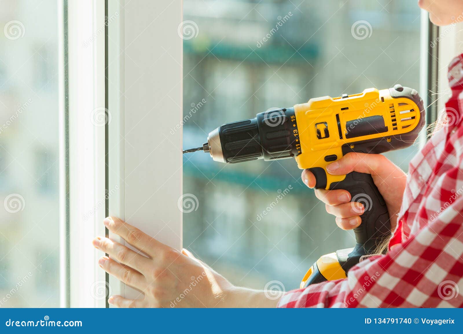 Person Using Drill on Window Stock Photo - Image of repair, tools ...