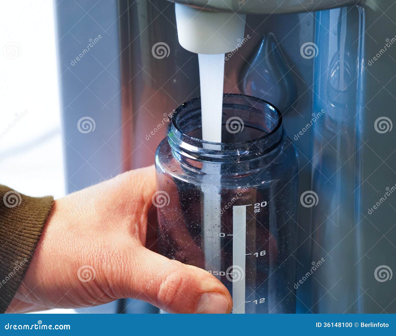Person Using Drink Dispenser Stock Photo - Image of liquid, hand: 36148100