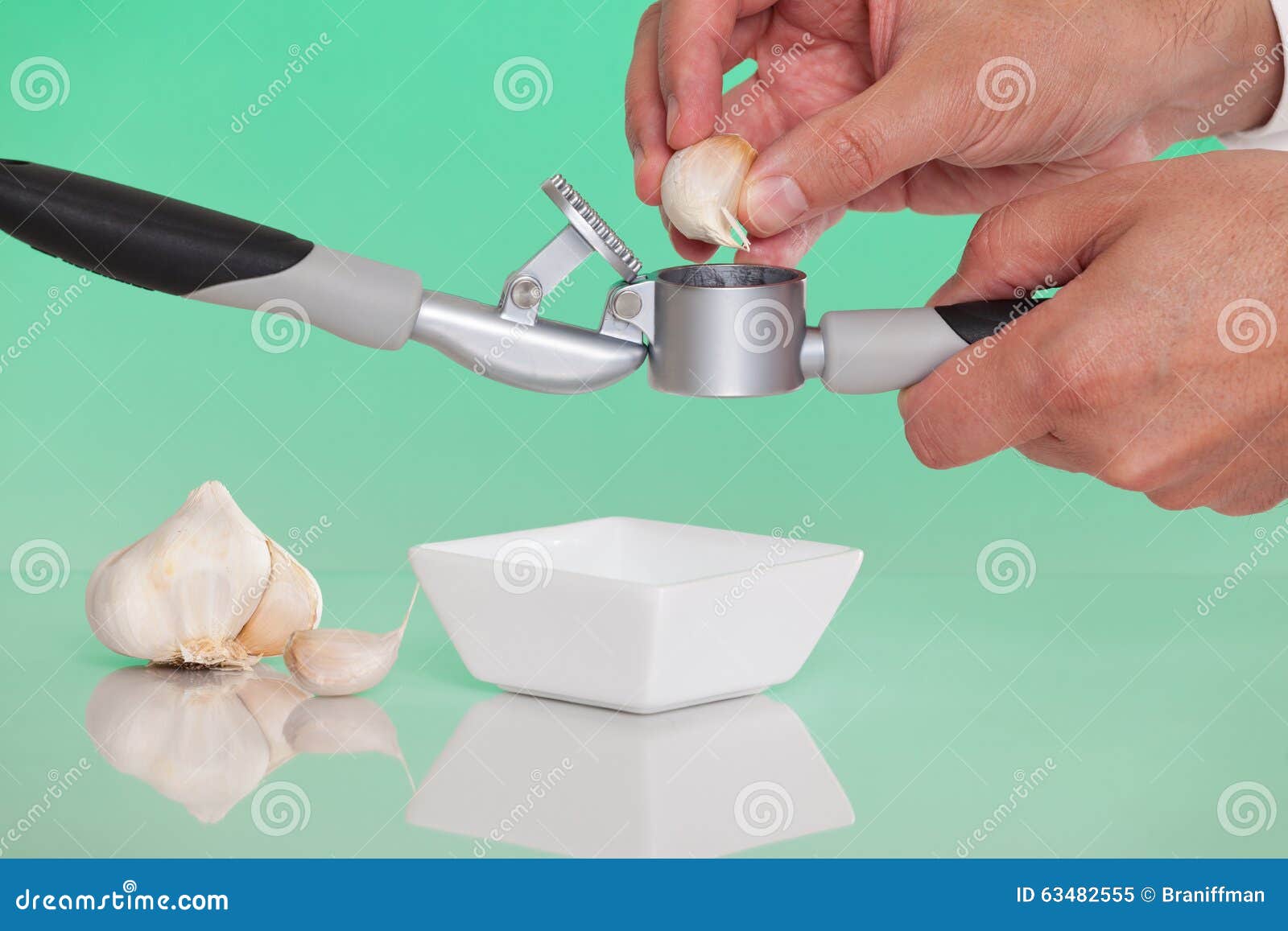 Person Using a Garlic Press Stock Image - Image of organic, ingredient ...