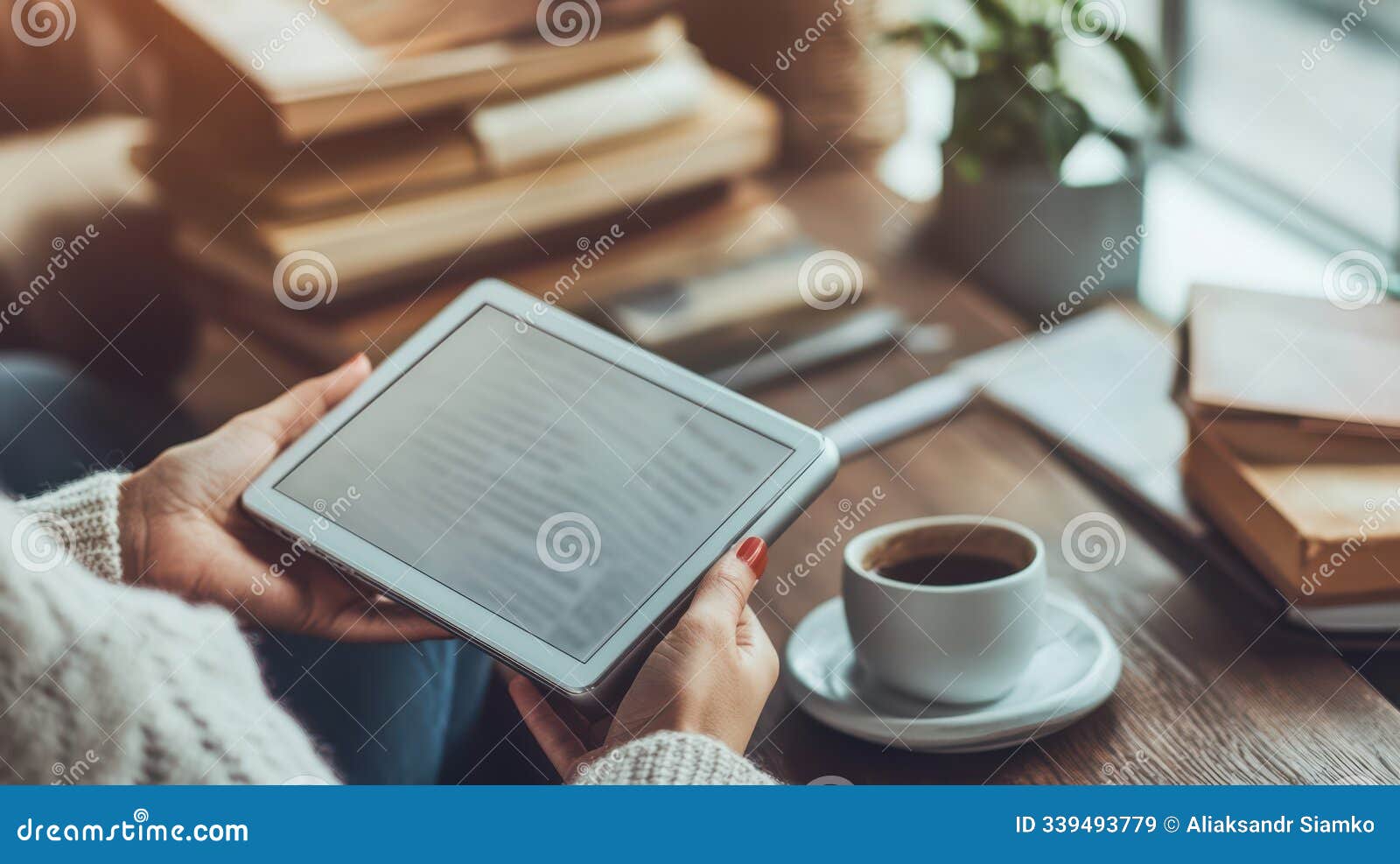 Person Using a High-tech E-reader with an E-ink Display for Reading ...