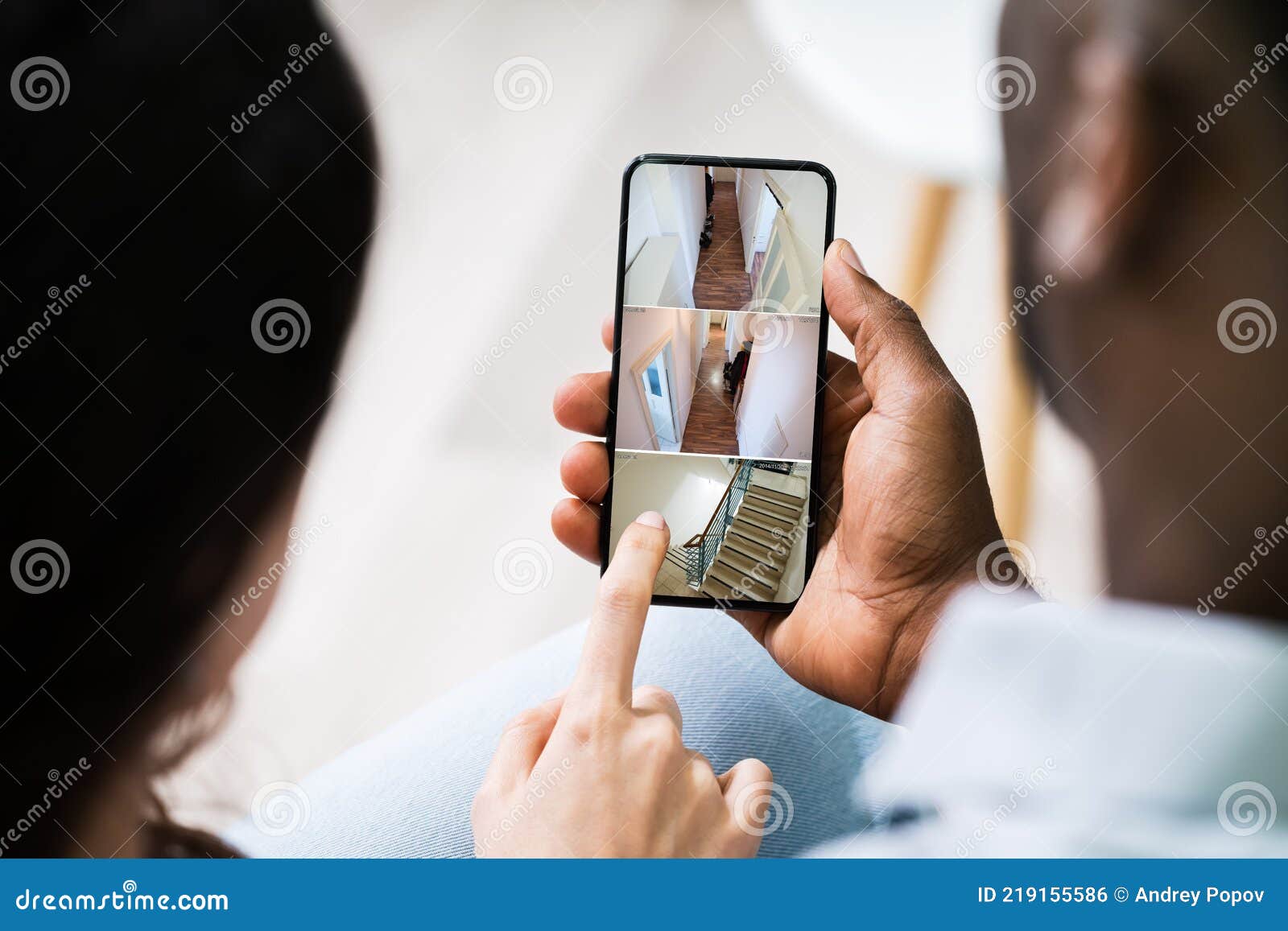Person Using Home Security System on Mobile Phone Stock Photo - Image ...