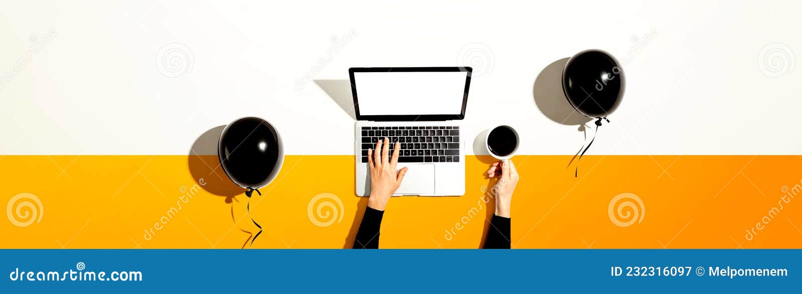 Person Using a Laptop Computer with Black Balloons Stock Image - Image ...