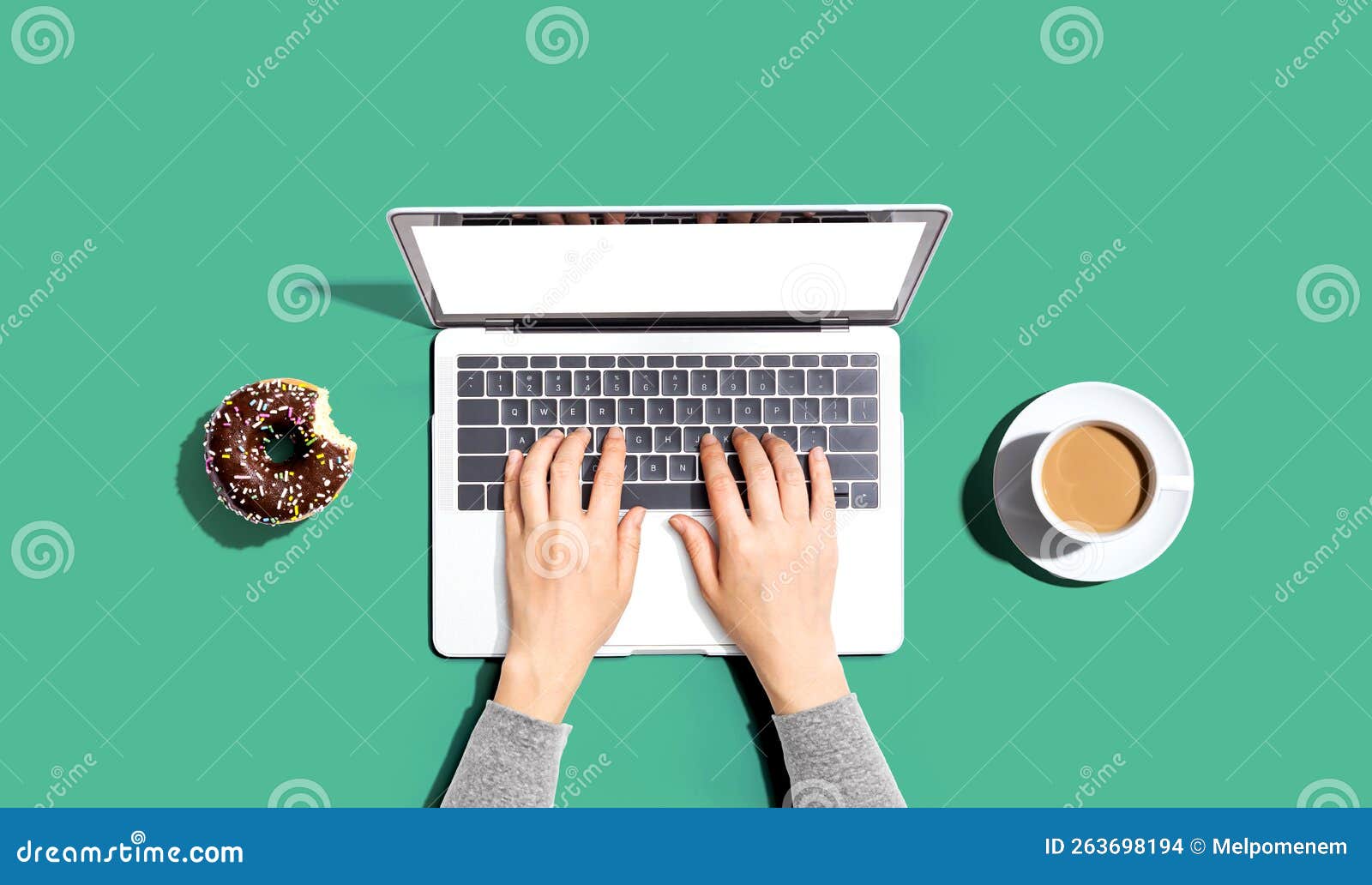 Person Using a Laptop Computer with a Donut and a Cup of Coffee Stock ...