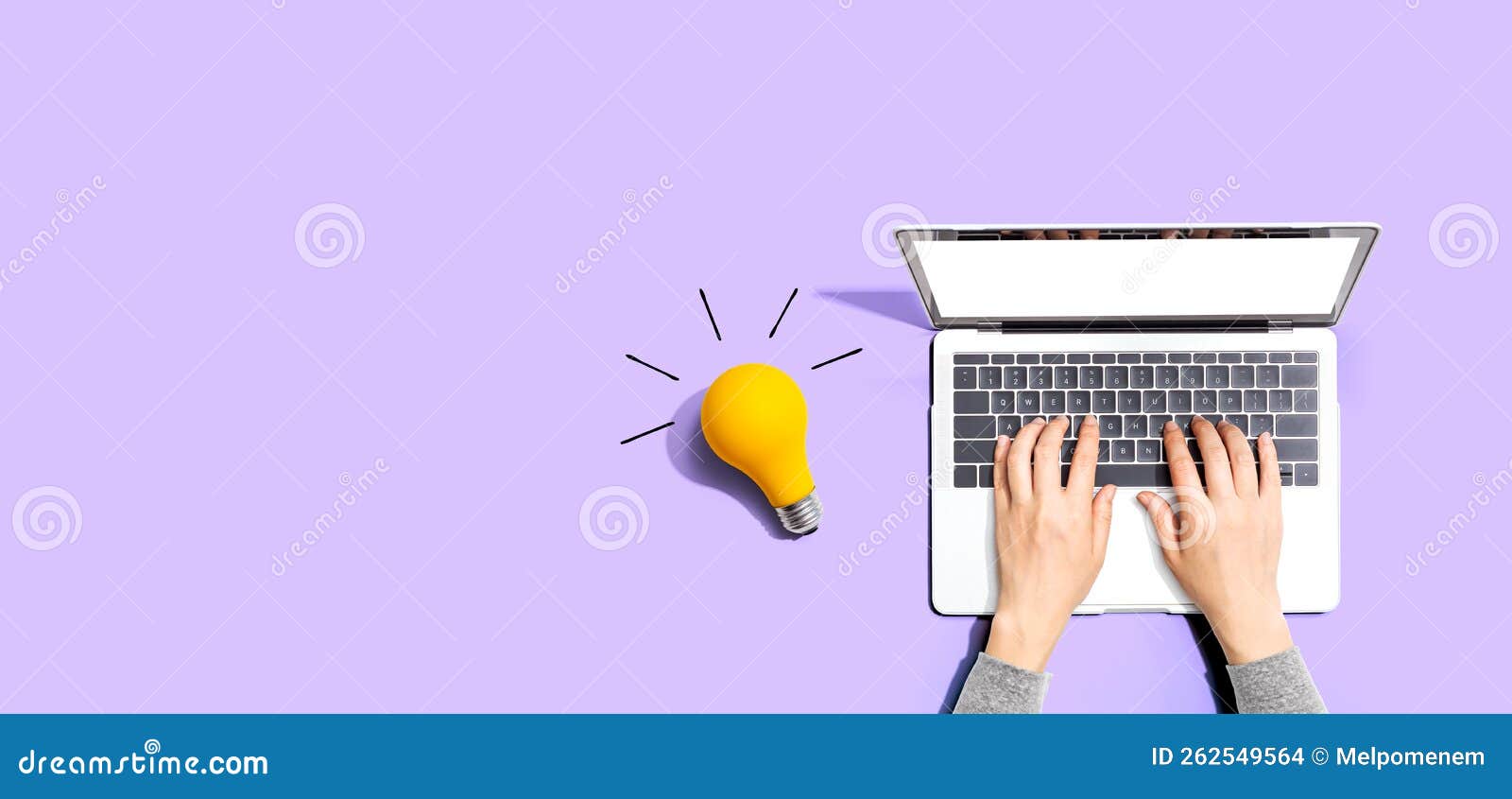 Person Using a Laptop Computer and a Light Bulb Stock Photo - Image of ...
