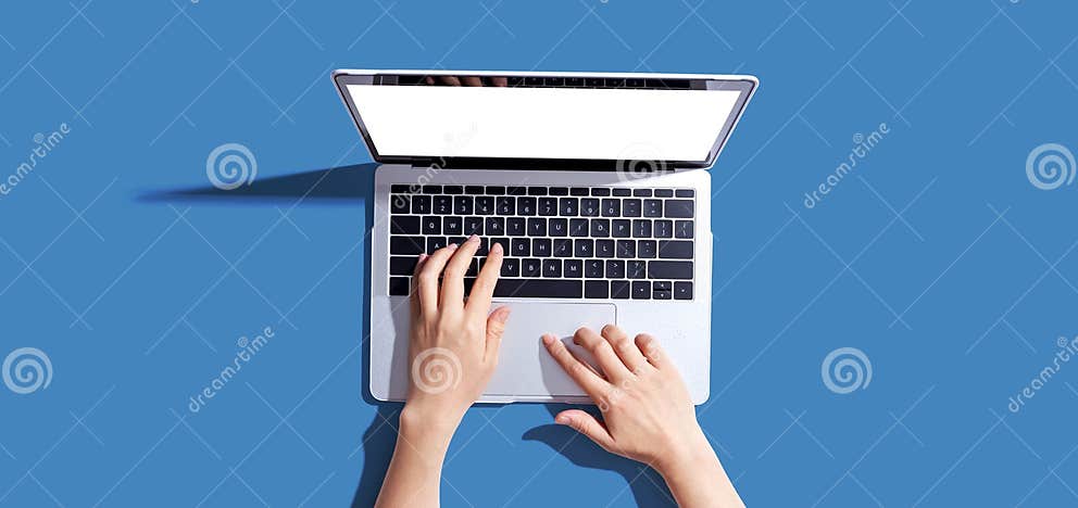 Person Using a Laptop Computer Stock Photo - Image of research, online ...