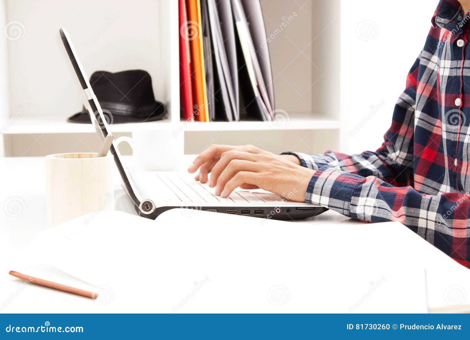 Person Using a Laptop Computer Stock Photo - Image of home, desk: 81730260