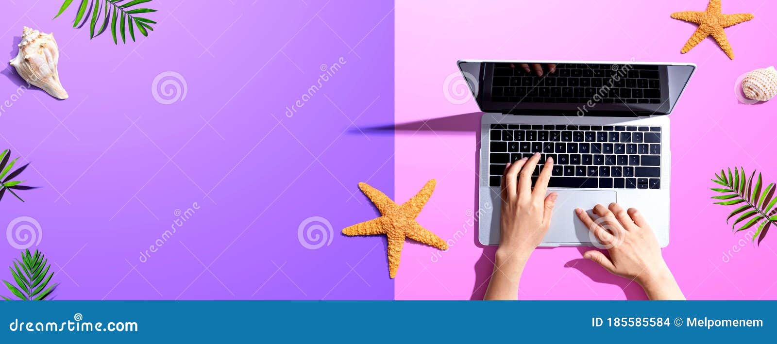 Person Using a Laptop Computer with Summer Theme Objects Stock Photo ...