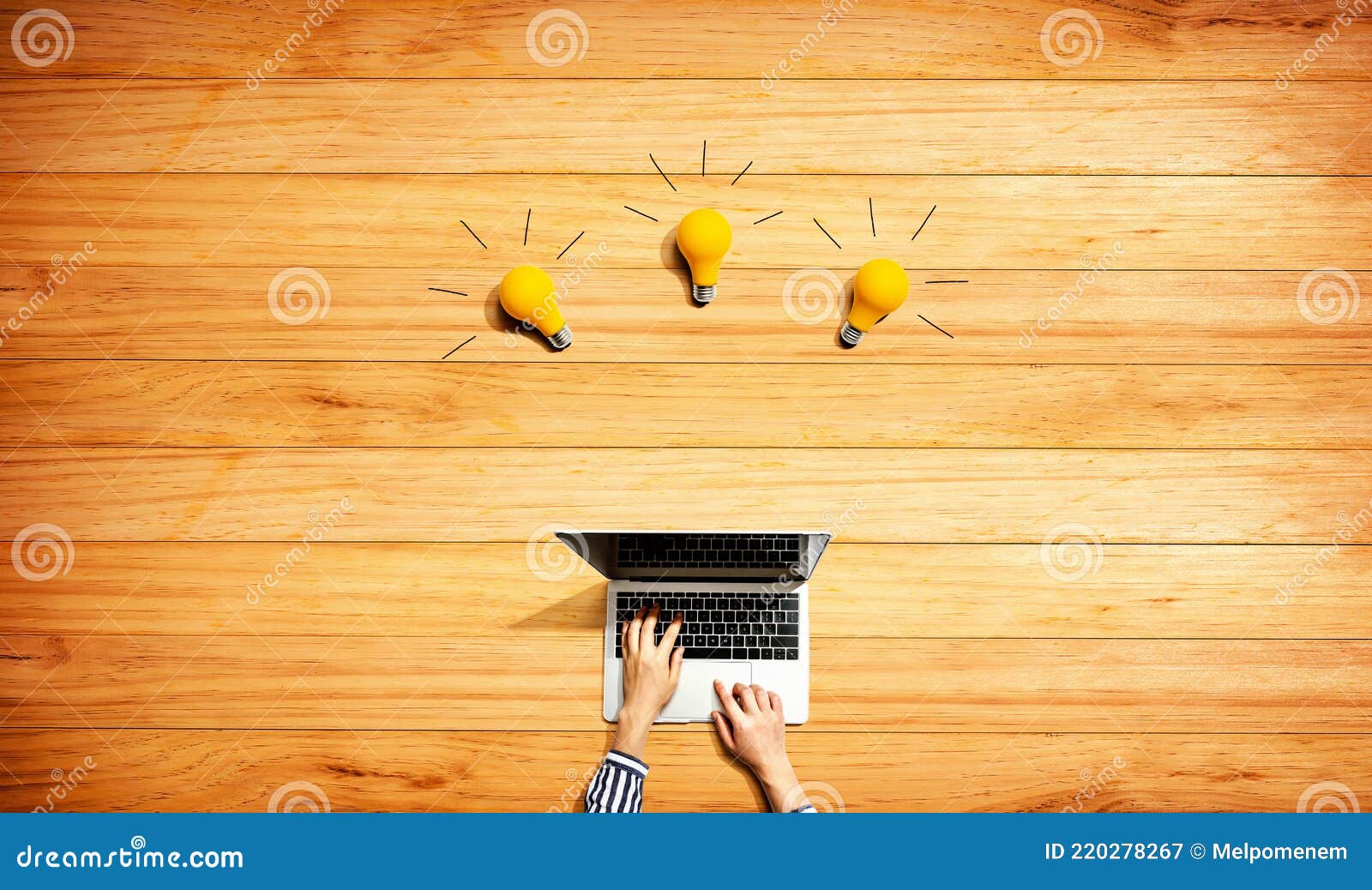Person Using a Laptop Computer with Three Light Bulbs Stock Image ...