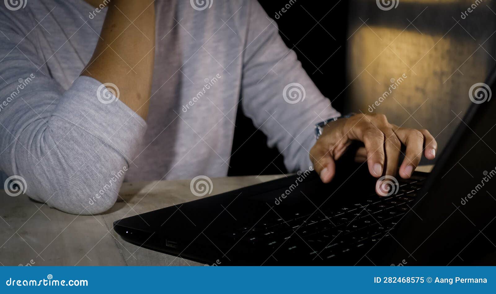 A Person Using a Laptop Typing on the Keyboard, Hard Worker. Stock ...