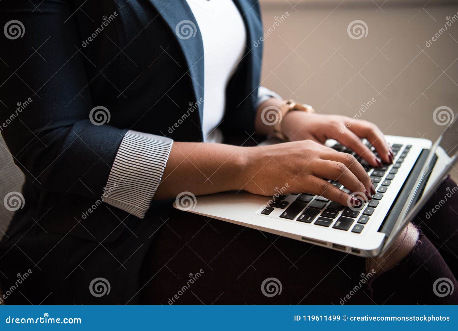 Person Using Macbook Air Picture. Image: 119611499