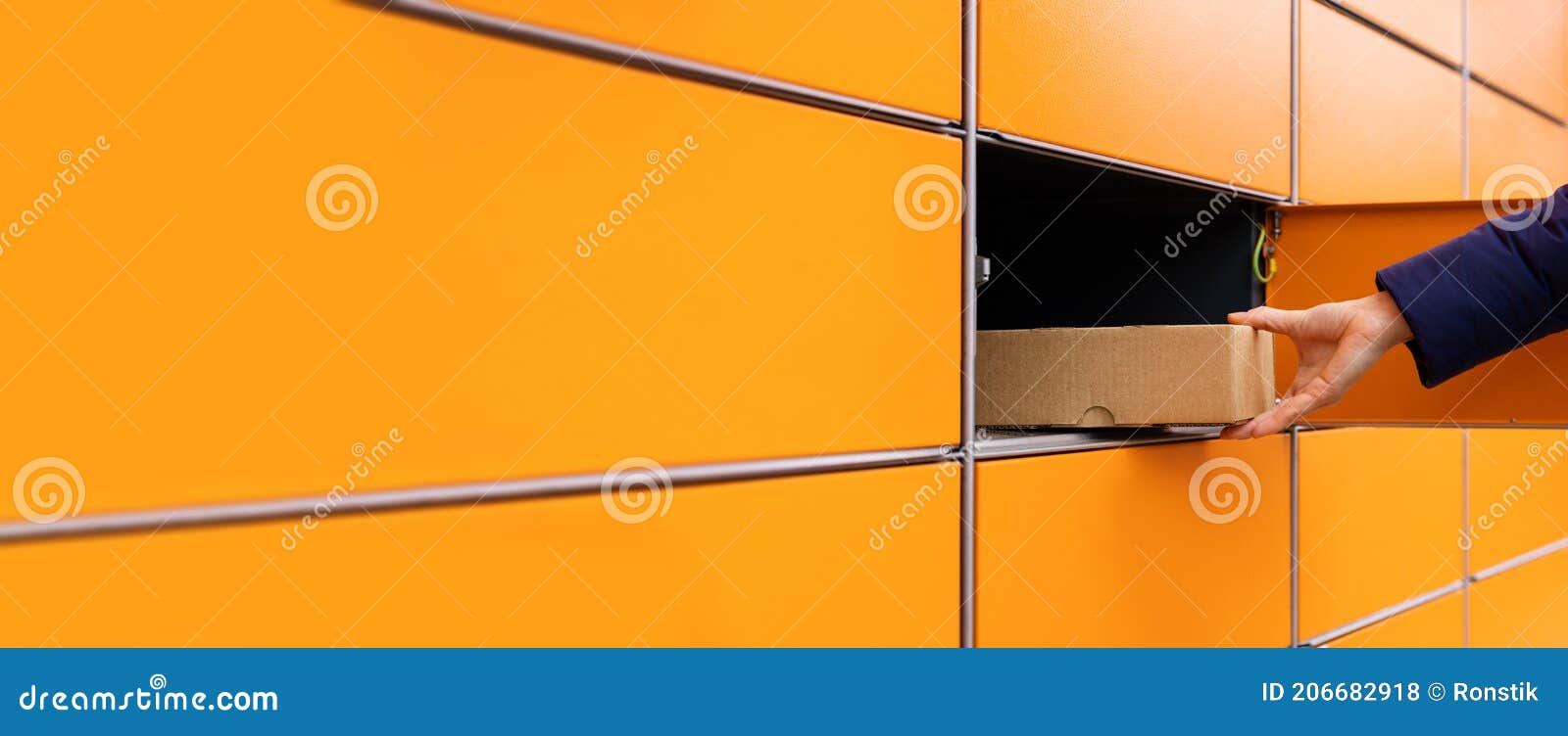 Person Using Self Service Parcel Terminal Machine To Send or Receive ...