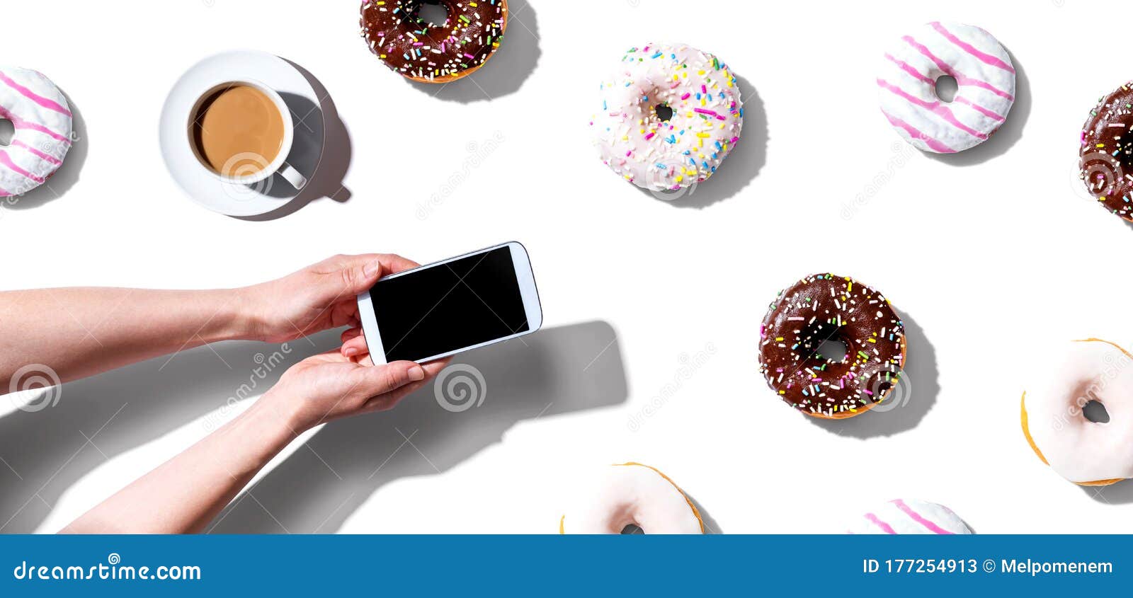 Person Using a Smartphone with Donuts Stock Image - Image of donut ...