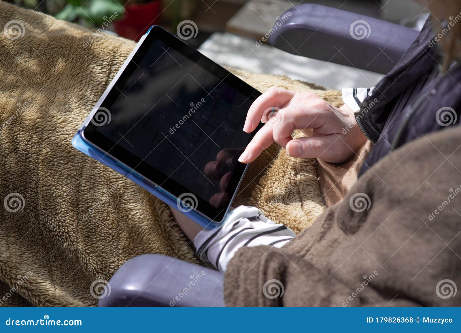 Person using tablet stock photo. Image of media, people - 179826368
