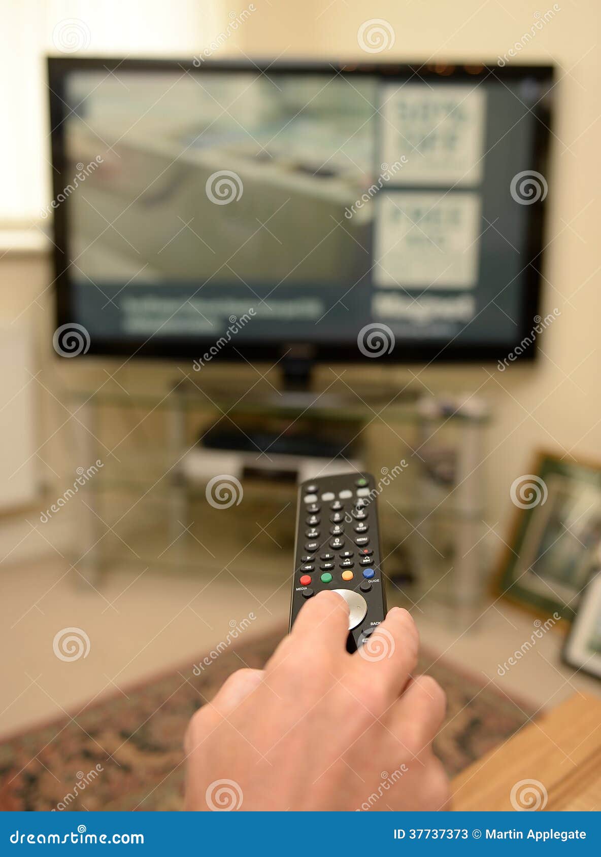 Person Using TV Remote Control Stock Image - Image of house, inside ...
