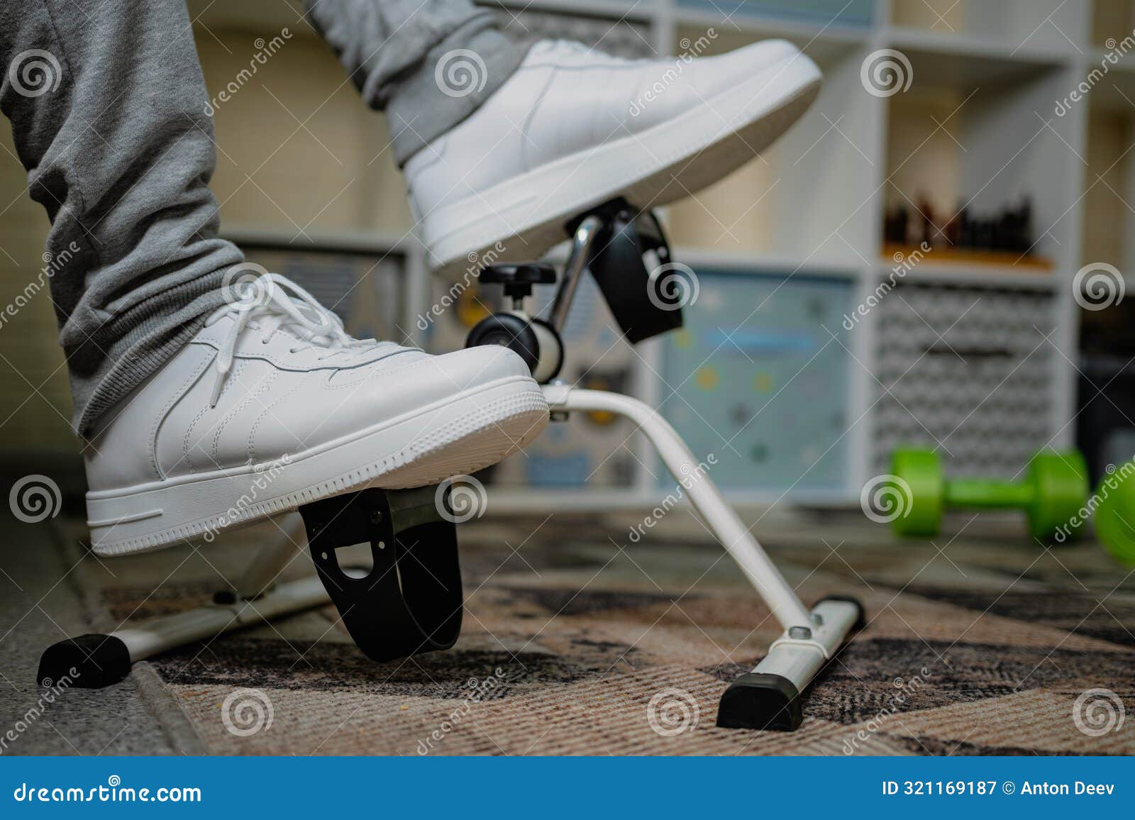 Person Using White Peddler Exercise Machine while Sitting Stock Image ...