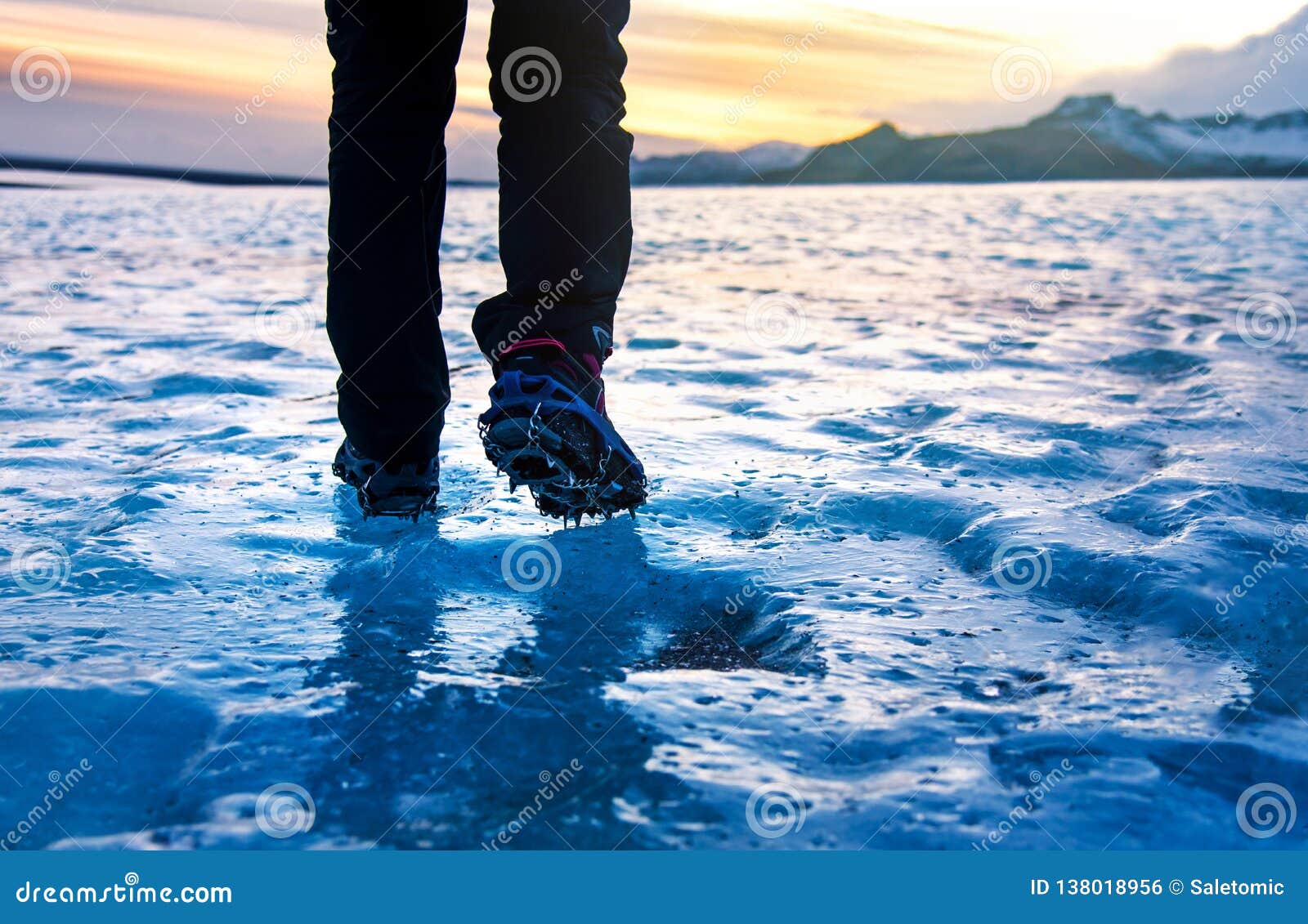 Person Walking on Glacier Ice Surface Wearing Crampons Stock Photo ...