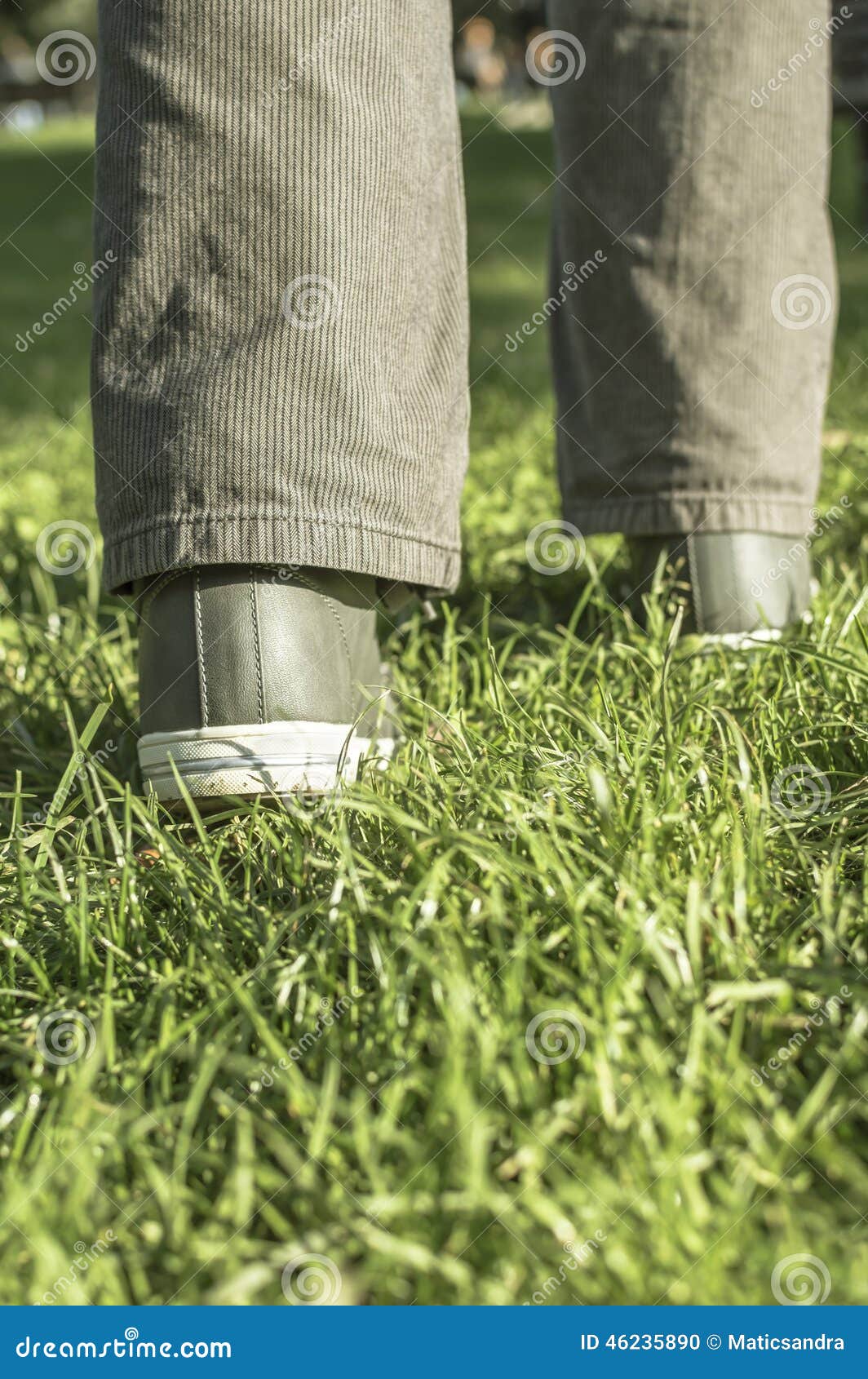 Person Walking on Green Grass Stock Photo - Image of strength, spring ...