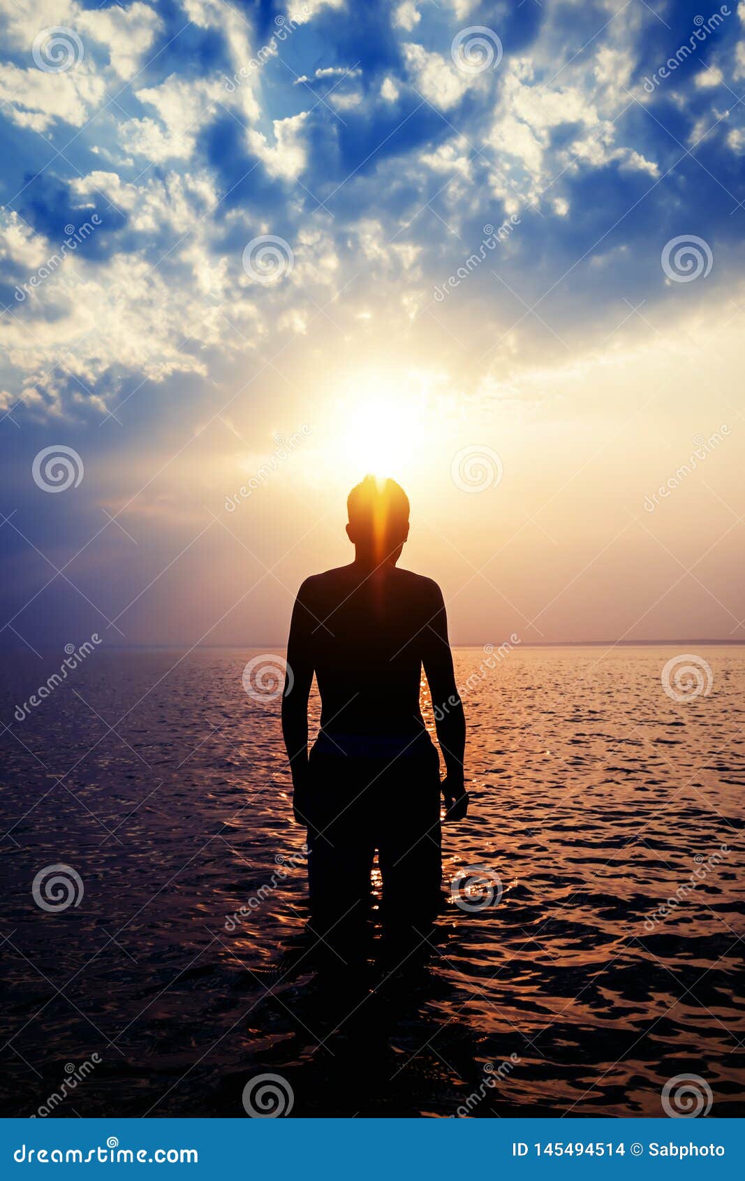 Person in the Water stock photo. Image of back, cloudscape - 145494514