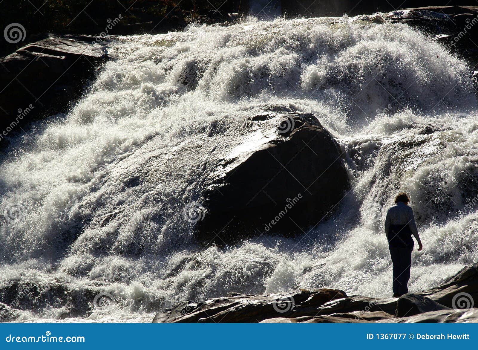 Person at waterfall stock image. Image of flow, thunderous - 1367077