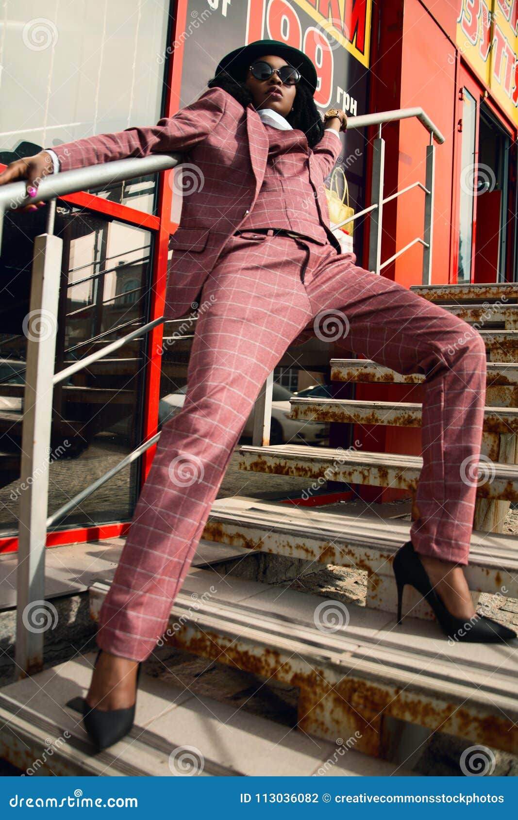 Person Wearing Brown Checkered Formal Outfit Picture. Image: 113036082