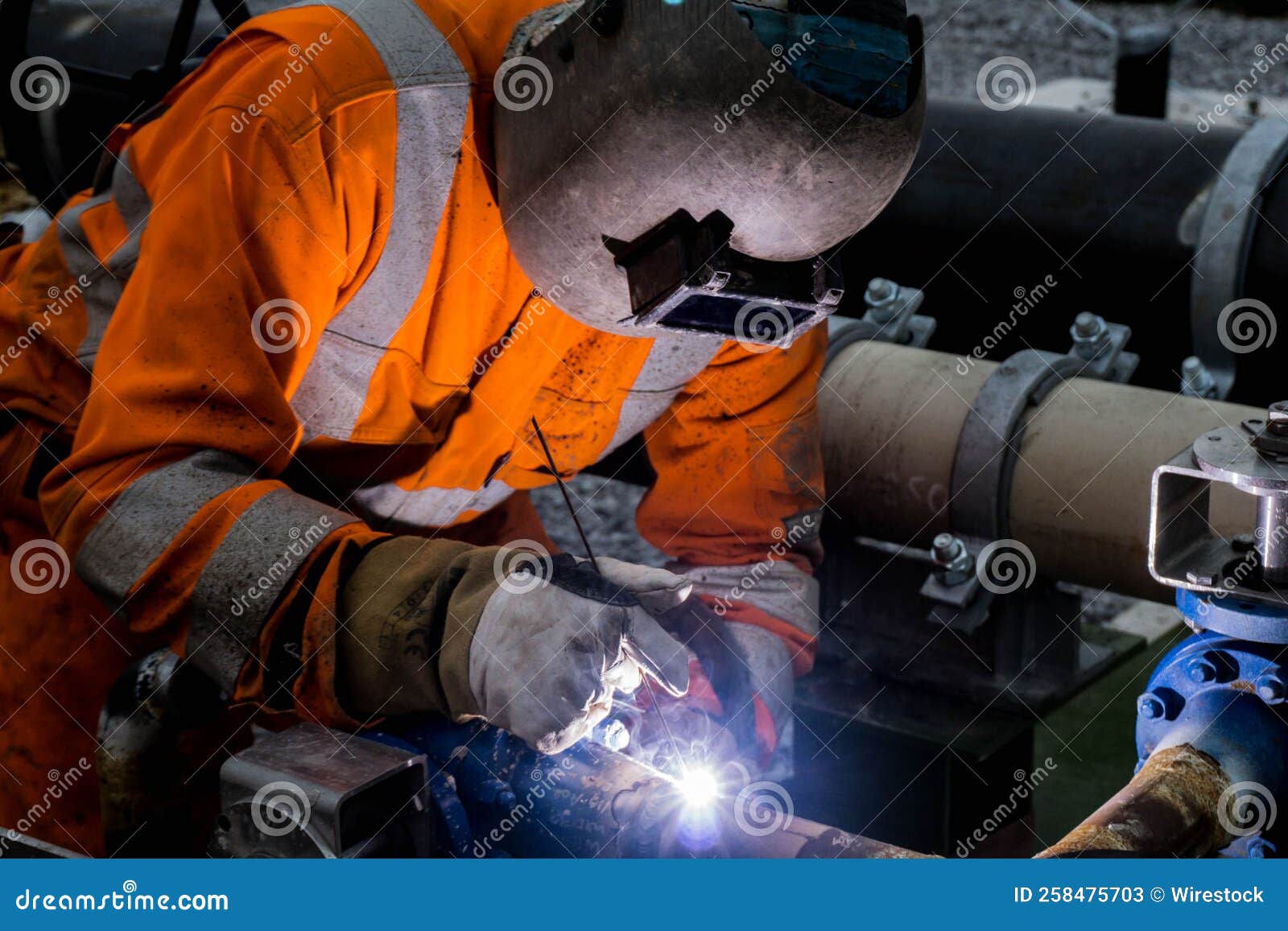 Person Welding at a Construction Site Stock Image - Image of working ...