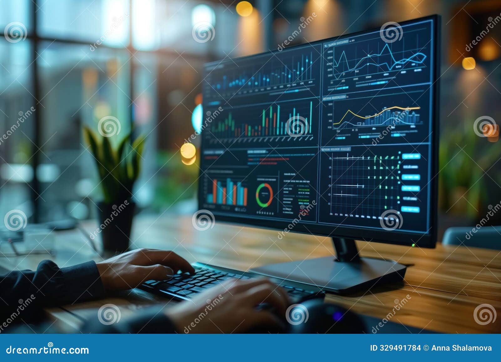 Person Working on a Computer with Multiple Dashboards Displaying Data ...