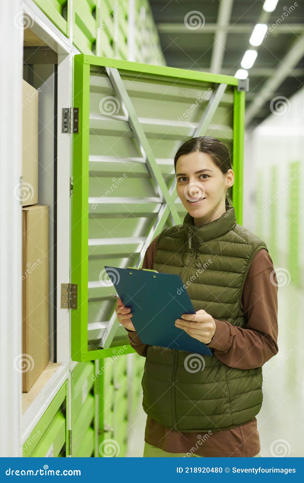 Person working in storage stock photo. Image of adult - 218920480
