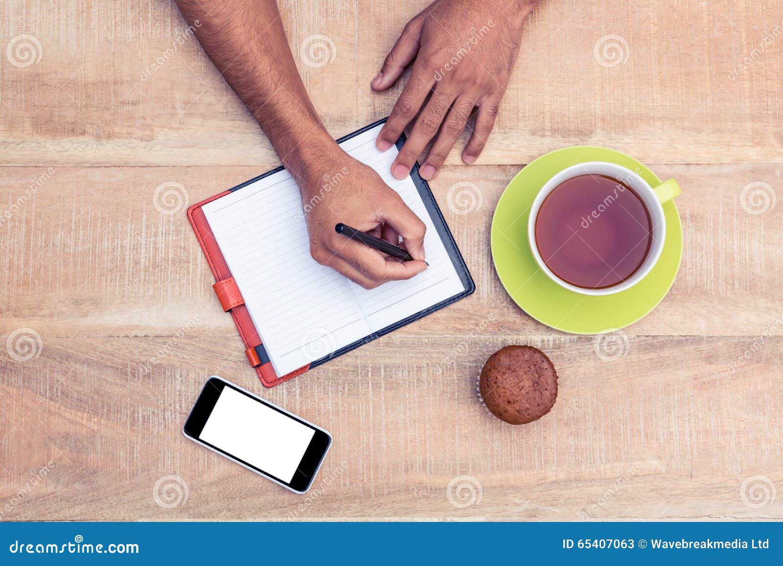 Person writing on diary stock image. Image of planning - 65407063