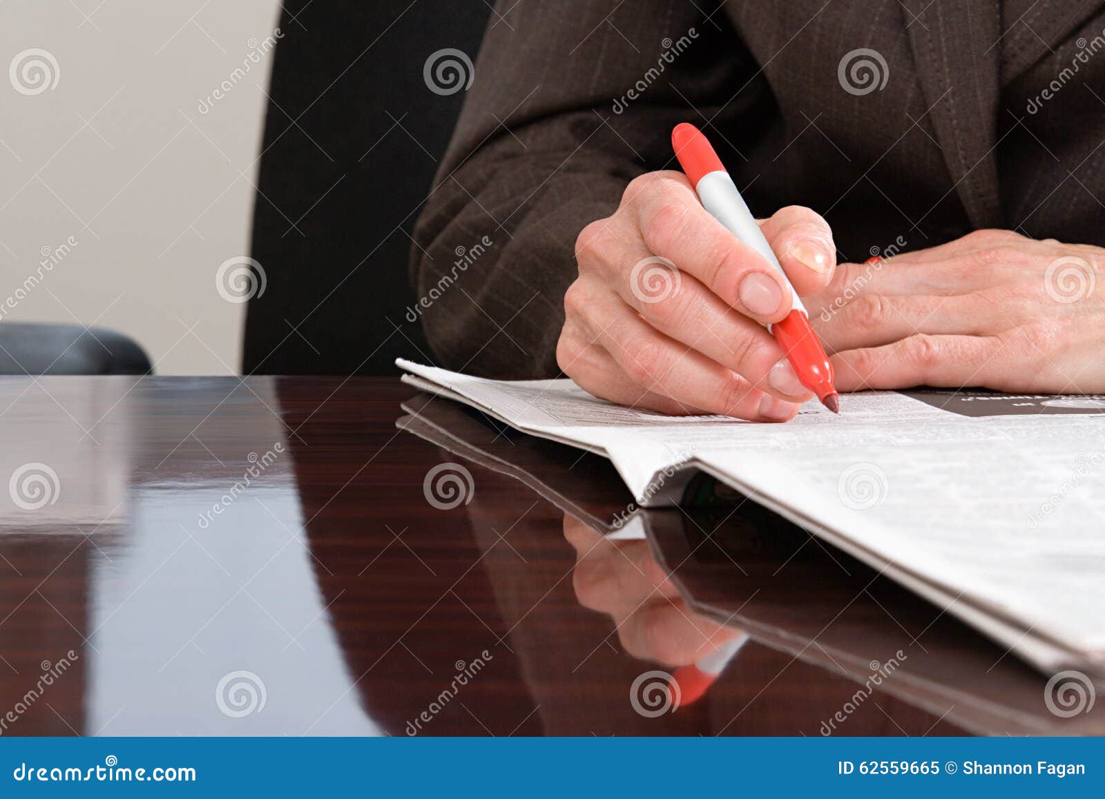 Person Writing on Newspaper Stock Image - Image of note, person: 62559665