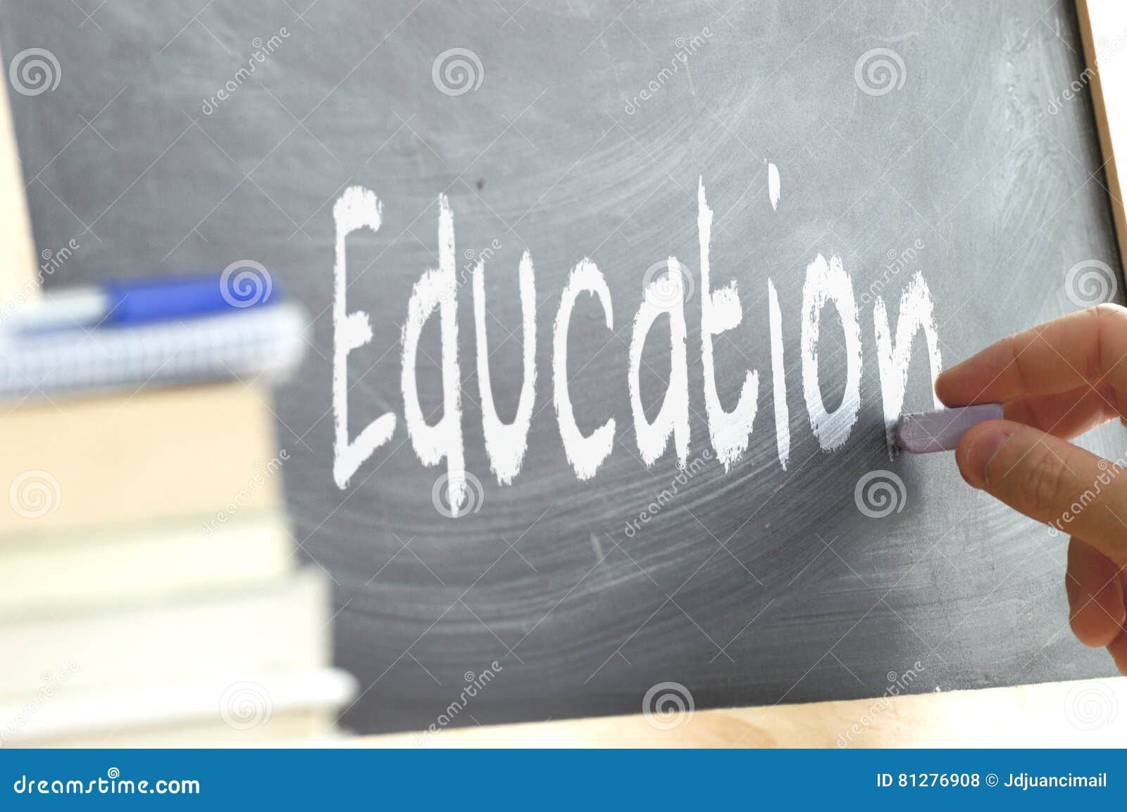 A Person Writing the Word Education on a Blackboard. Stock Photo ...