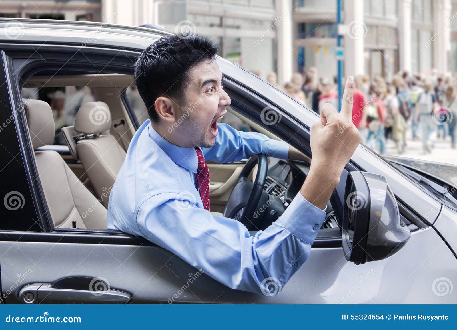 Persona Enfadada Que Conduce Un Coche Foto de archivo - Imagen de dedo ...