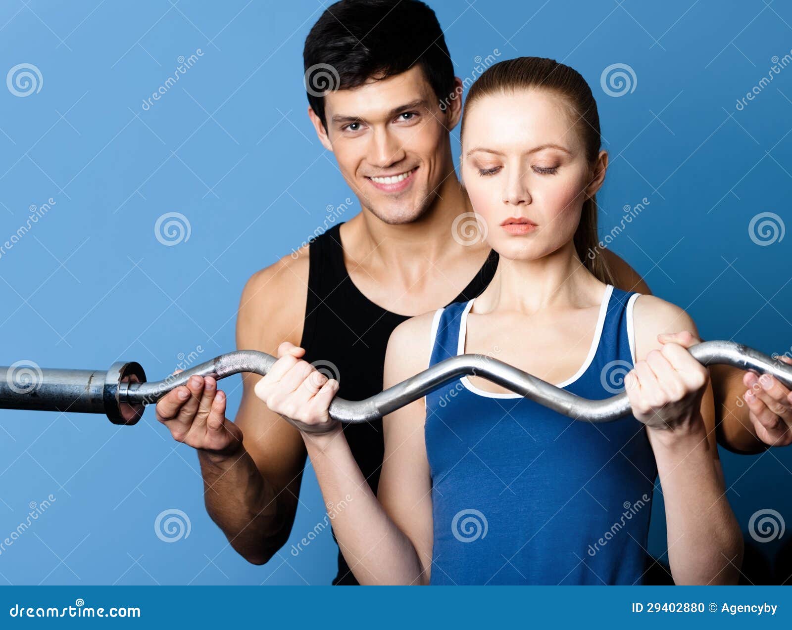 Personal Coach Shows Woman the Correct Exercise Performing Stock Photo ... Personal Coach Shows Woman the Correct Exercise Performing Stock Photo ...