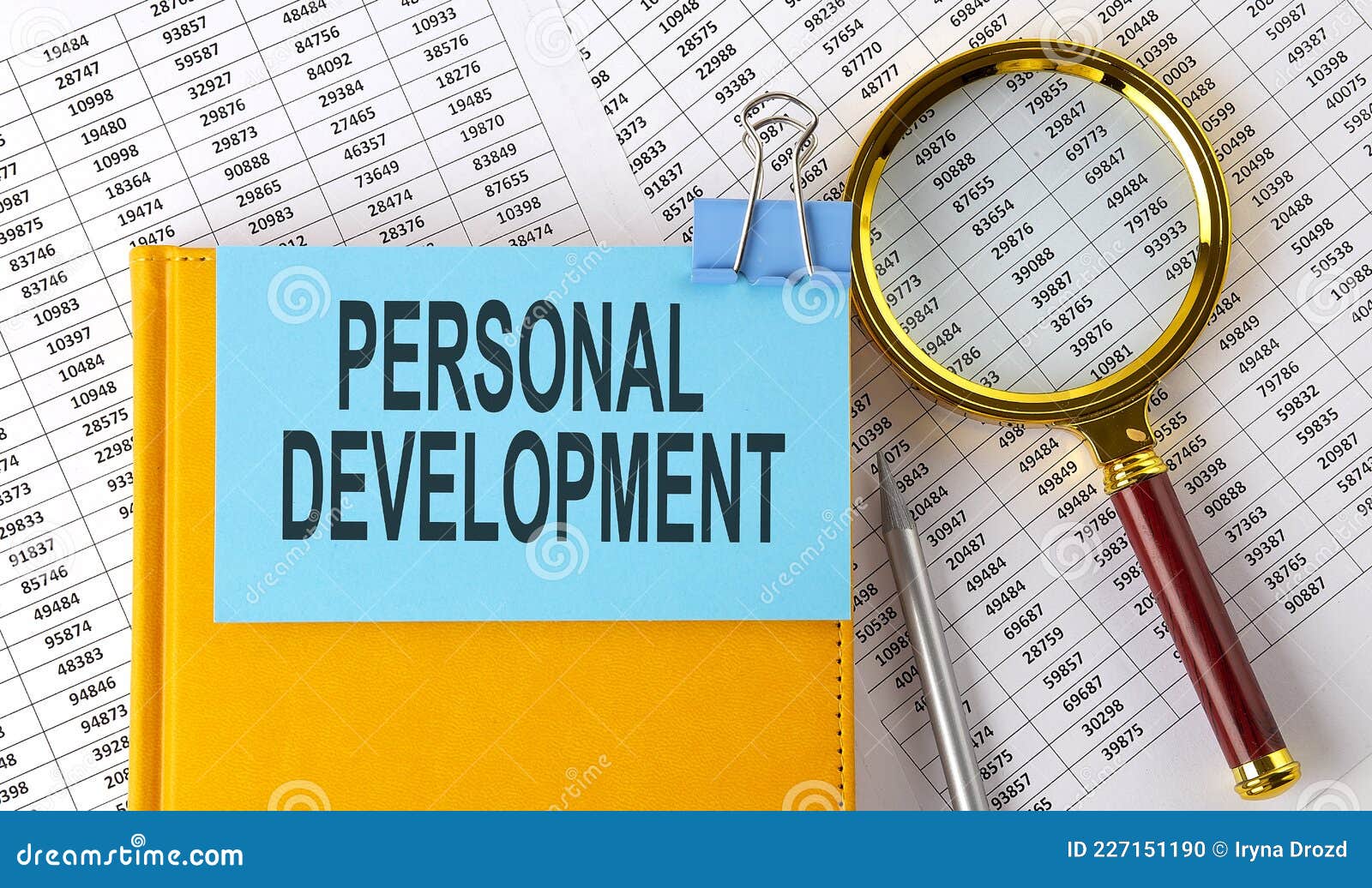 PERSONAL DEVELOPMENT Text on Sticker on Notebook with Magnifier and ...