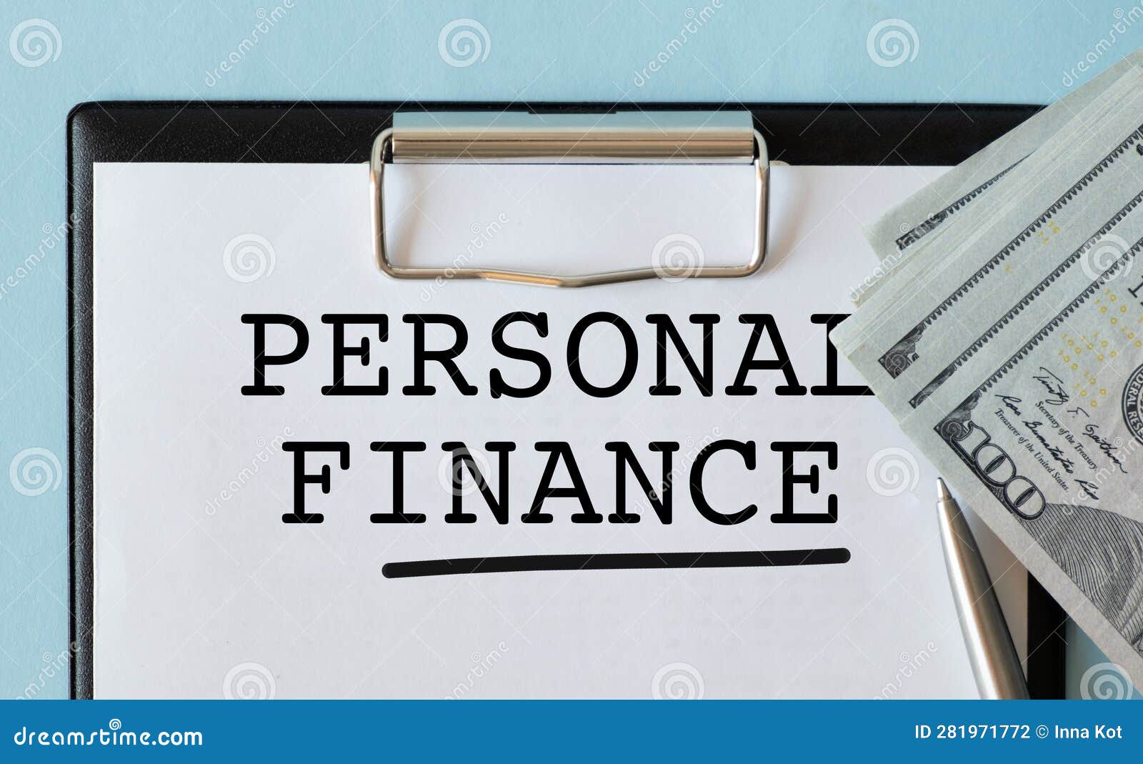 PERSONAL FINANCE Text on a Notebook with Clipboard and Calculator on a ...