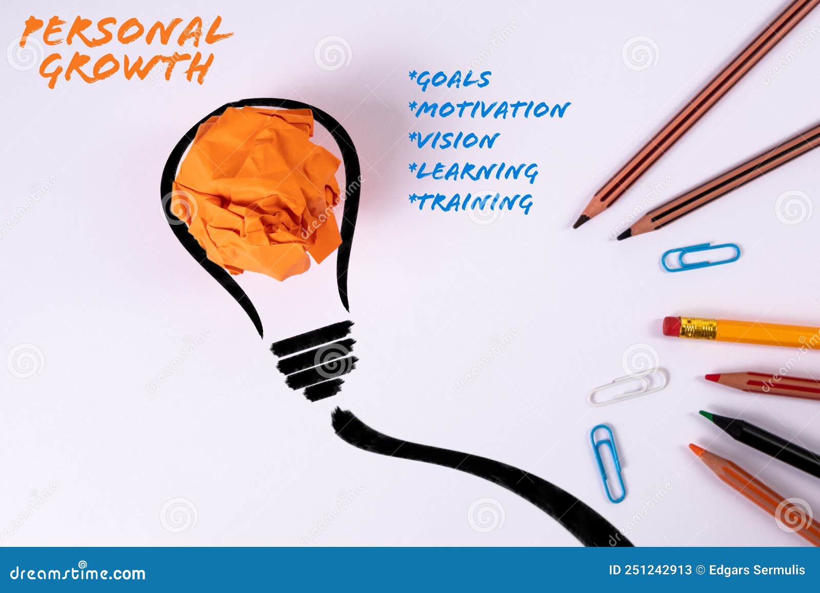 Personal Growth Concept. Abstract Light Bulb and Office Supplies on a ...