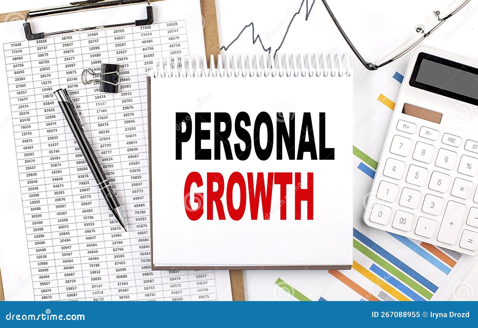 PERSONAL GROWTH Text on Notebook with Chart, Calculator and Pen Stock ...