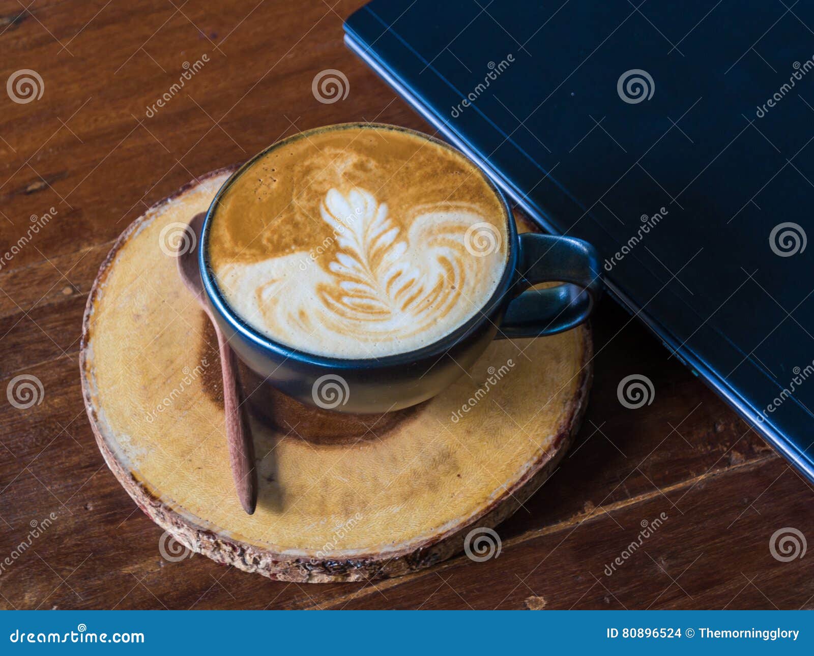 Personal Laptop Computer with Cup of Coffee on a Wooden Table Stock ...
