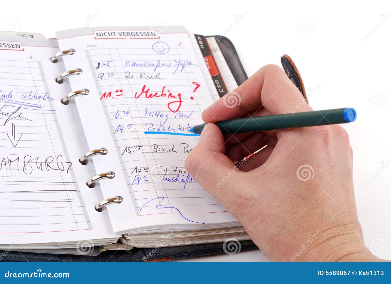 Personal Organizer And Pen On The Desk The Background Of Graphs Stock ...