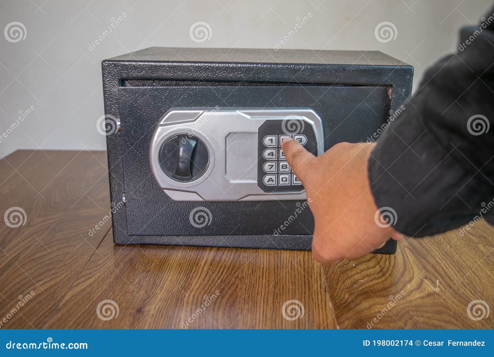 Personal Perspective of Man Opening Safe with Code Stock Photo - Image ...