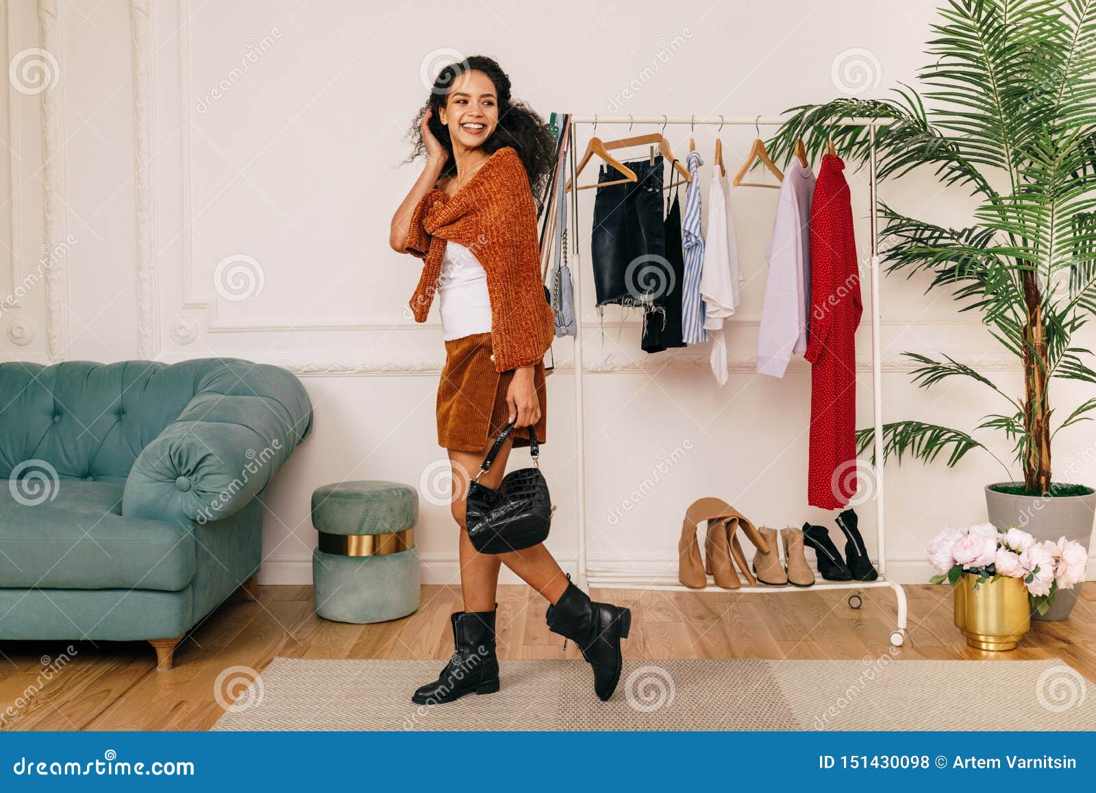 Personal Stylist Demonstrating New Look in Studio Stock Photo - Image ...