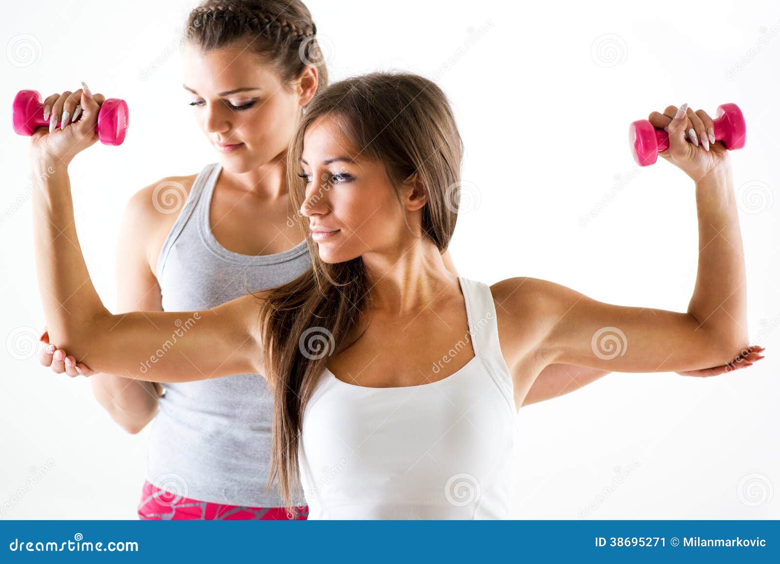 Personal Trainer Assisting a Client Stock Image - Image of beautiful ...
