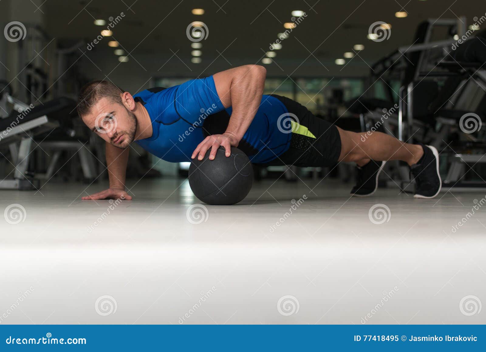 Personal Trainer Doing Push-ups on Floor in Gym Stock Image - Image of ...