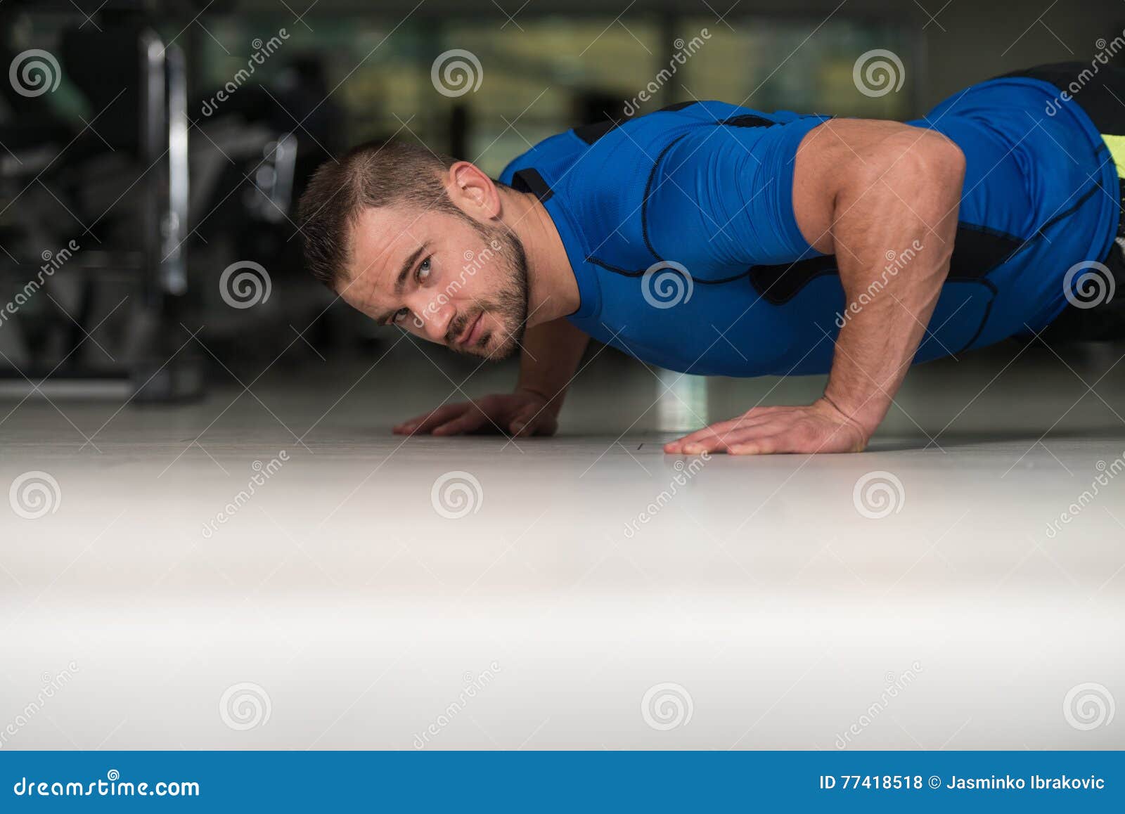 Personal Trainer Doing Push-ups on Floor Stock Photo - Image of ...