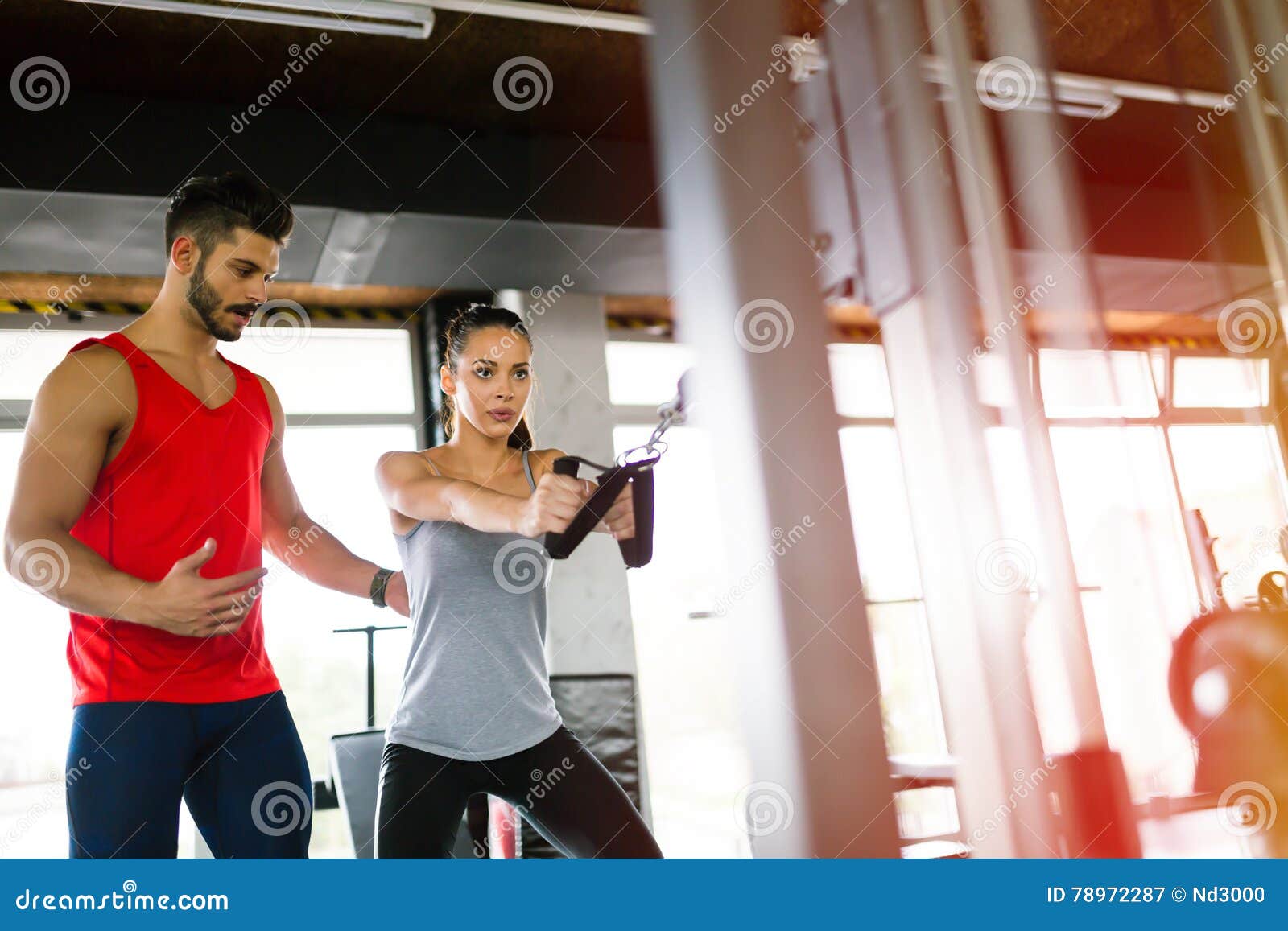 Personal Trainer Giving Instructions in Gym Stock Image - Image of ...