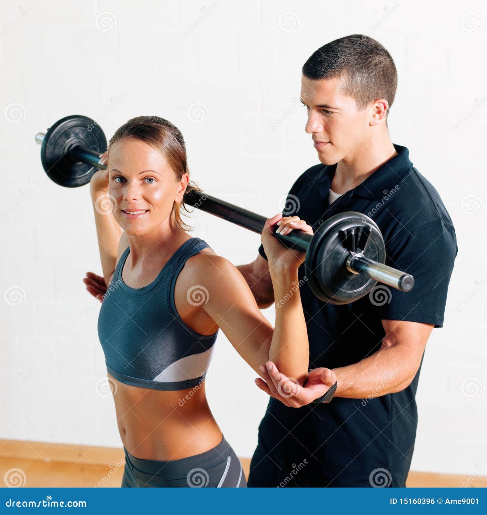 Personal Trainer in gym stock photo. Image of exercise - 15160396