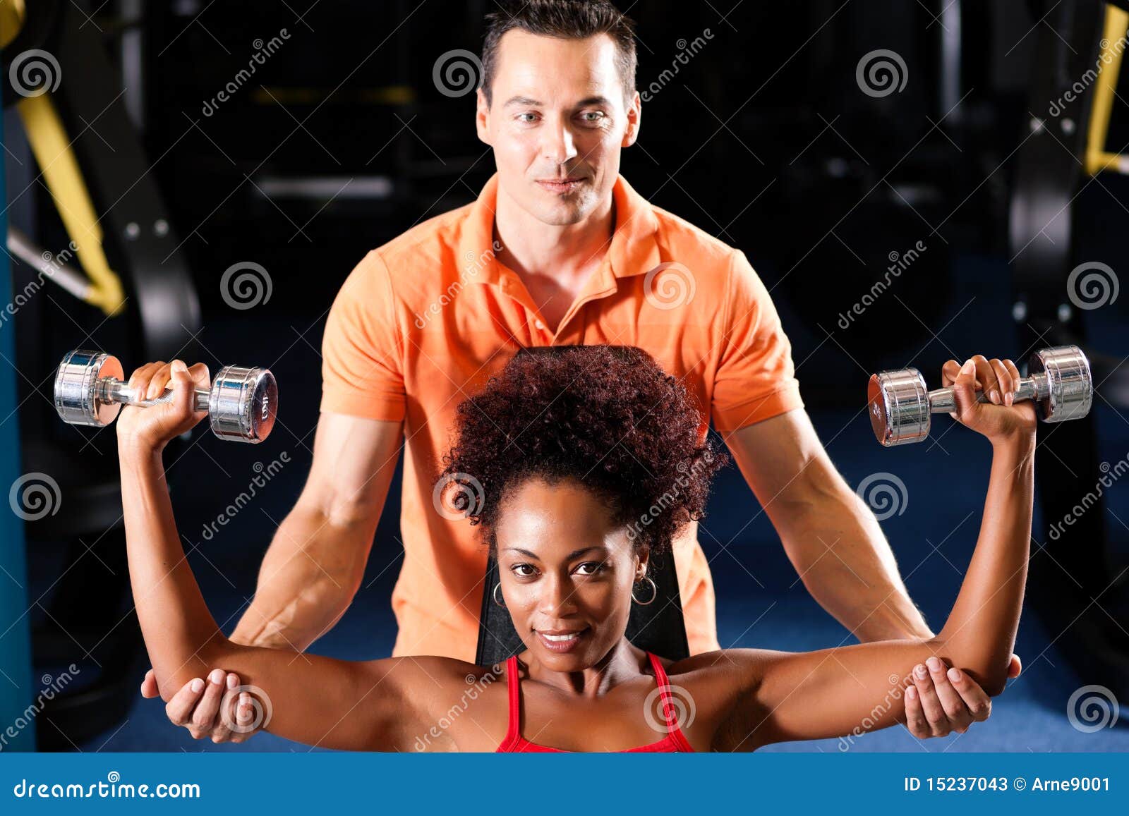 Personal Trainer in gym stock image. Image of active - 15237043