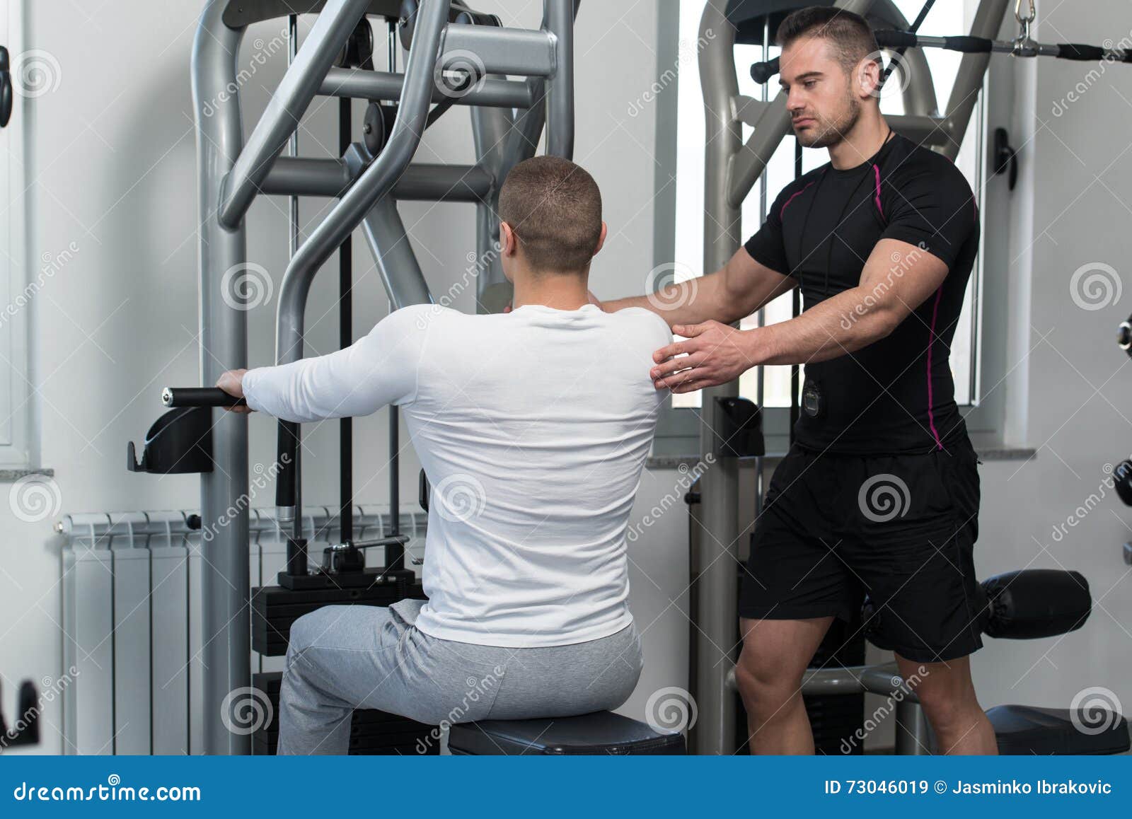 Personal Trainer Helping Client in Gym Stock Image - Image of endurance ...